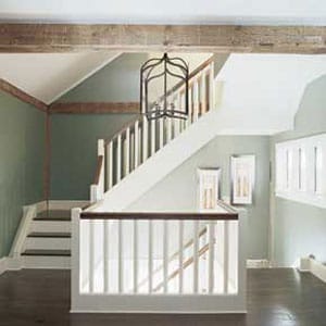 Second-floor staircase landing and stairs to first and third floor.