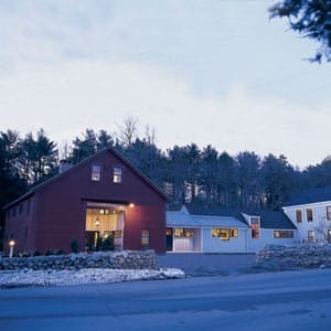 Historic 1849 Greek Revival farmhouse with connected barn.